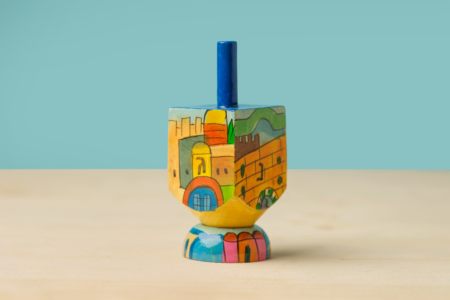 Jerusalem Metal Cutout Medium Dreidel & Stand - Israel Cart